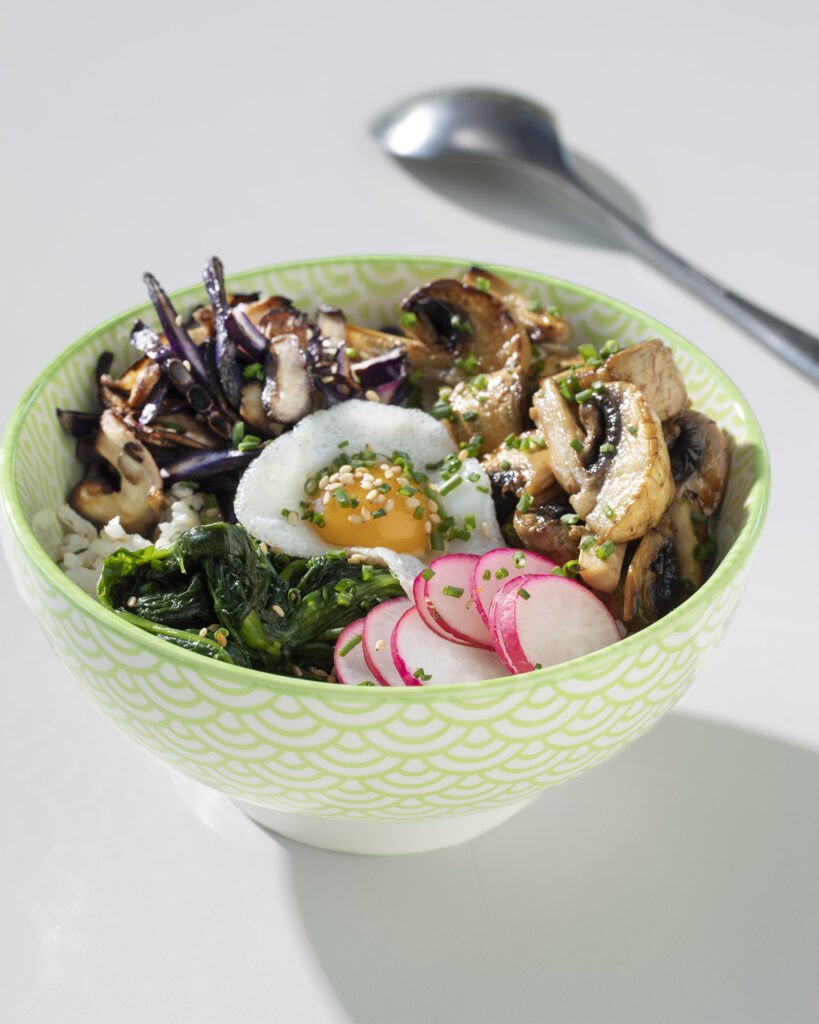 Brown rice poke bowl with vegetables, mushrooms and sesame seeds ...